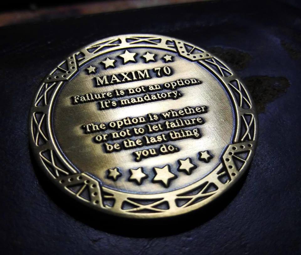 Coin Maxim 70 – Schlock Mercenary Store